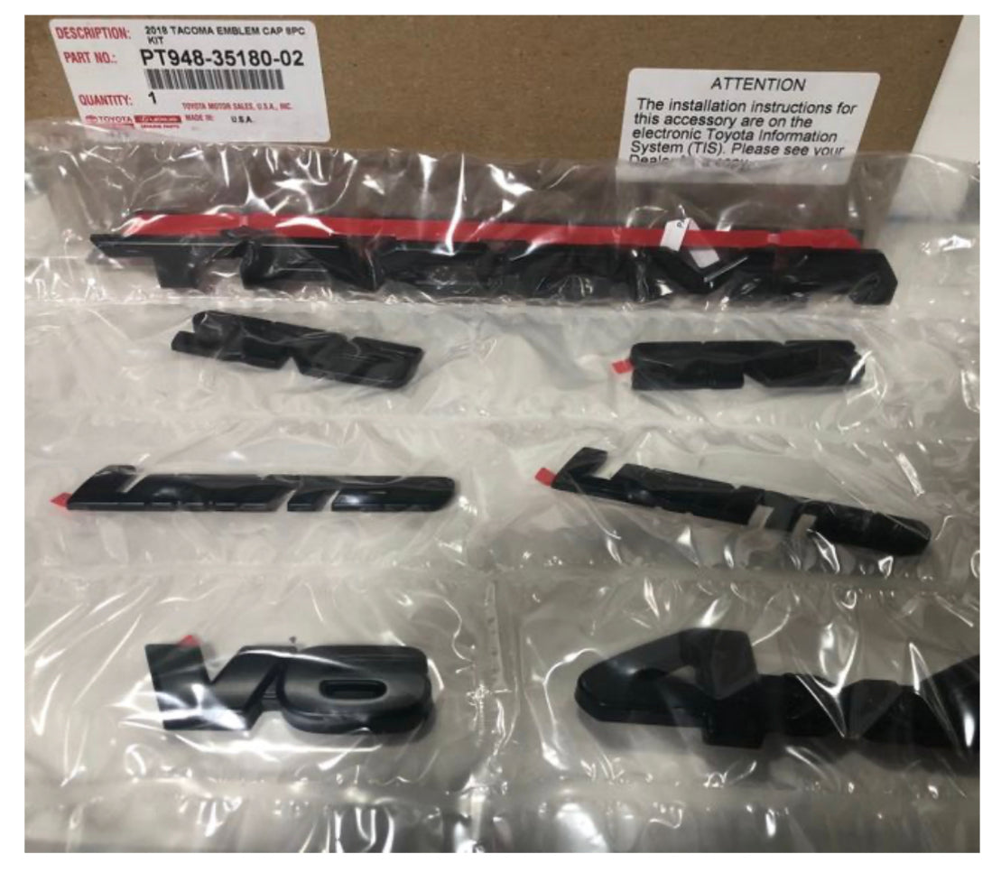 2016-2023 Tacoma Emblem OEM Black Overlay 8PC PT948-35180-02 – MJ ...